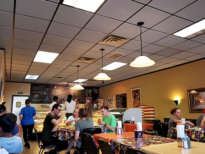 Inside, the cozy dining area with its colorful tablecloths and display cases feels like the neighborhood caf&eacute; you've been searching for your entire life.