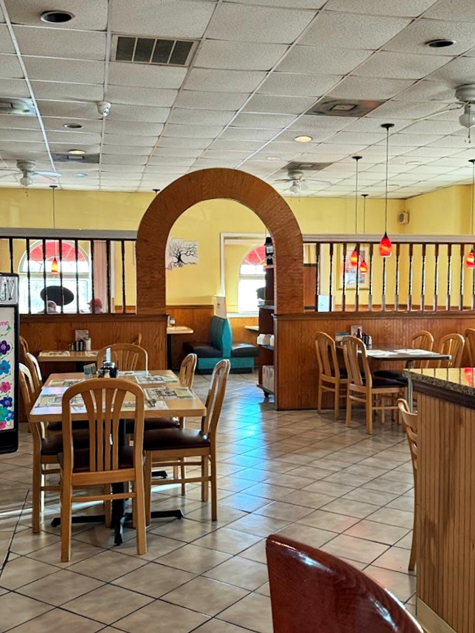Classic wooden arches and cozy booths create that perfect diner atmosphere&mdash;where conversations flow as freely as the coffee.