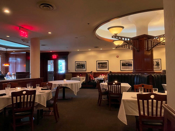 White tablecloths and dark wood paneling create that perfect "special occasion" atmosphere where memories are made between magnificent bites.