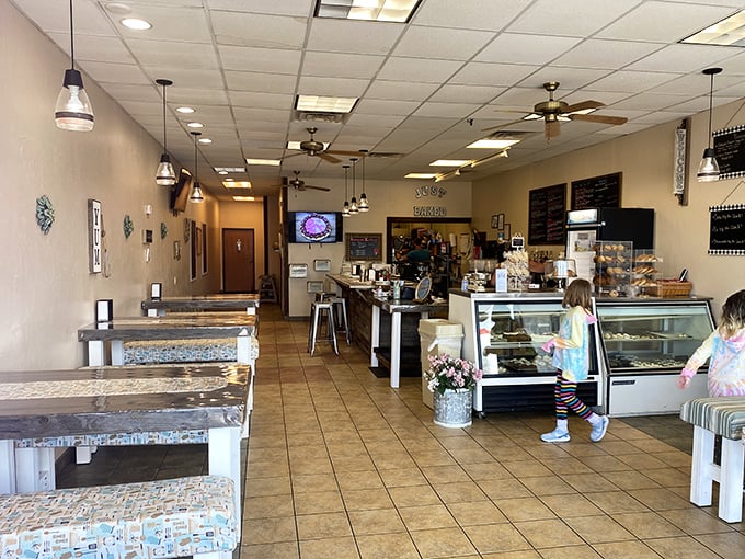 The warm, inviting interior feels like walking into your favorite aunt's kitchen—if your aunt happened to be a pastry genius with commercial-grade equipment.