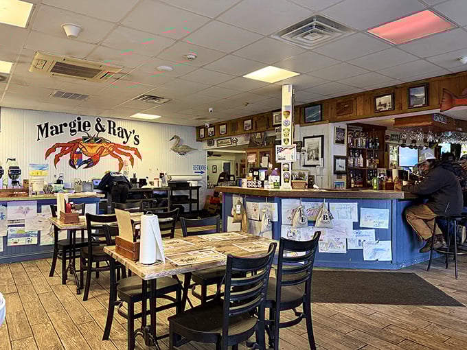 Inside, nautical charm meets no-nonsense dining. That giant red crab on the wall isn't just decoration&mdash;it's a promise of what awaits.