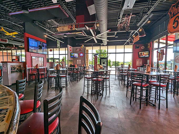 Industrial chic meets comfort zone &ndash; exposed ductwork, concrete floors, and the promise of a perfect burger waiting at every table.