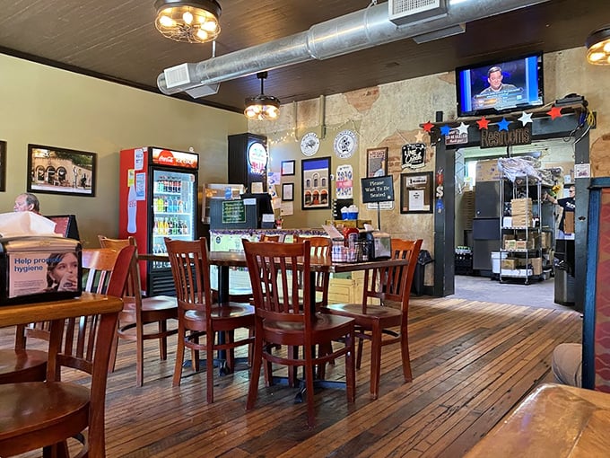 Inside, worn wooden floors and exposed ductwork create that perfect "been here forever" vibe where memories are made one slice at a time.