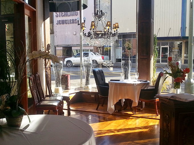 Sunlight streams through windows, dancing across white tablecloths and crystal chandeliers &ndash; Southern elegance that whispers "special occasion" while promising comfort.