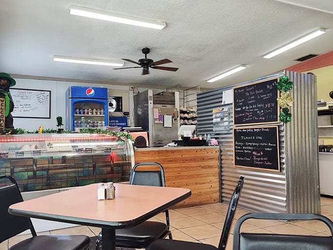 Where fluorescent lighting and ceiling fans set the stage for culinary magic. The chalkboard specials and wooden counter whisper, "You've found the real deal."