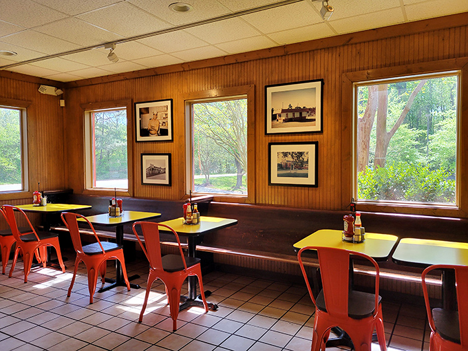 Wood paneling and orange chairs create the perfect no-frills backdrop for serious eating. This isn't Instagram decor&mdash;it's barbecue authenticity at its finest.
