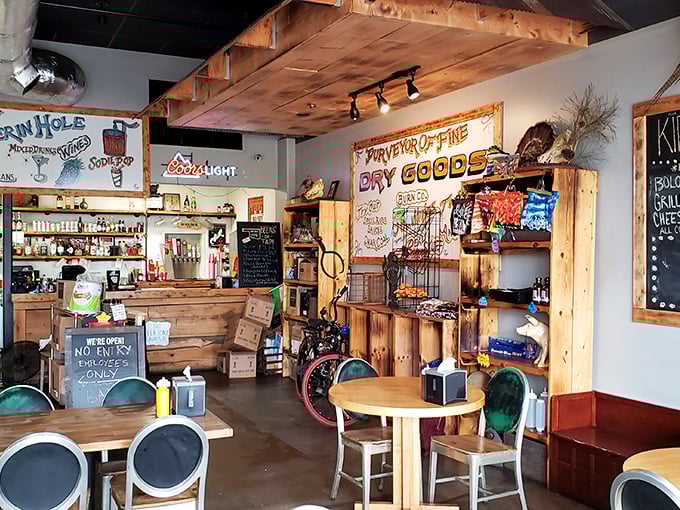 Rustic charm meets barbecue authenticity inside, where wooden beams and handwritten signs create the perfect backdrop for serious meat appreciation.