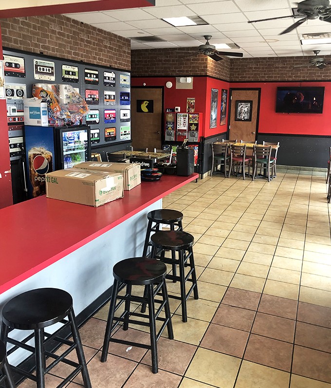 Red countertops and cassette tape decor transport you to simpler times. This isn't just a restaurant—it's a time machine with excellent food.