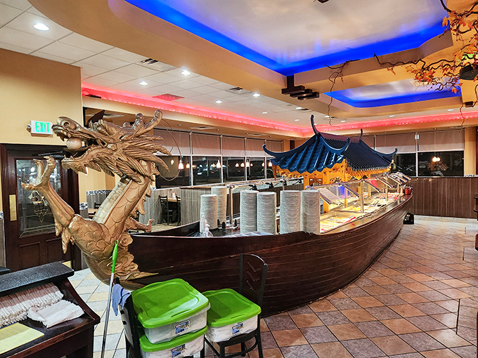 A dragon-prowed boat buffet that would make Viking foodies weep with joy. The blue lighting adds underwater magic.