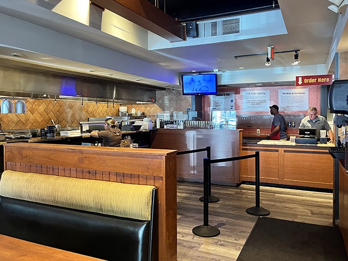 Where burger magic happens. The open kitchen concept lets you witness the transformation from humble ingredients to transcendent meal.