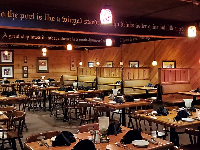 Literary quotes dance above diners' heads as wooden tables and amber lighting create the perfect atmosphere for carnivorous contemplation.