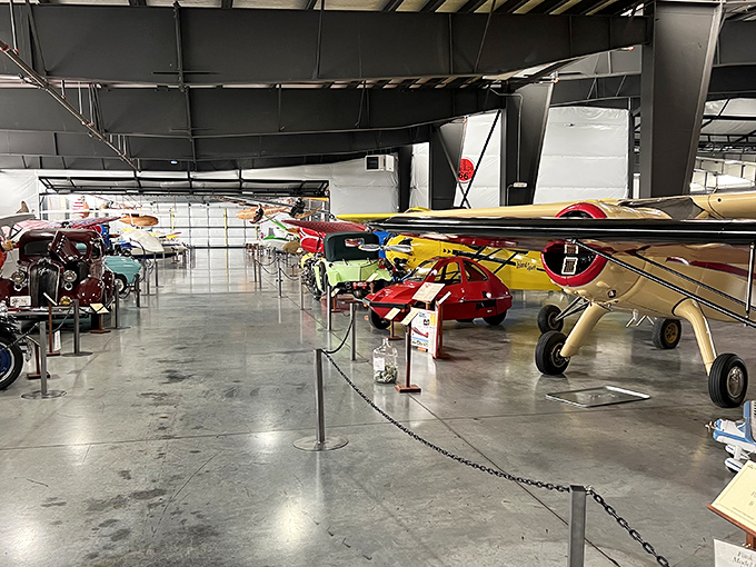 A symphony of steel and chrome awaits inside, where vintage vehicles stand like patient time travelers ready to share their stories. 