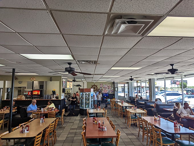 Simple tables, ceiling fans, and the buzz of happy diners create the perfect no-frills atmosphere where the food, not the decor, rightfully takes center stage.