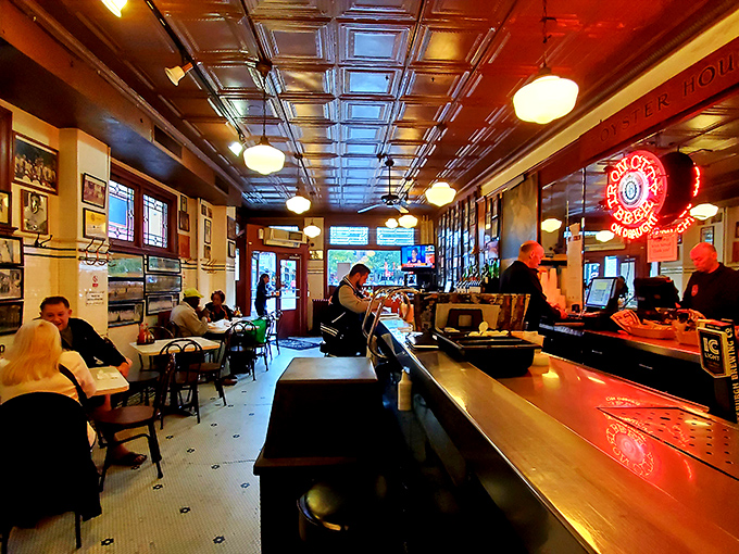Step inside and time stands still. The vintage tin ceiling, classic bar, and decades of memories create an atmosphere no designer could replicate.