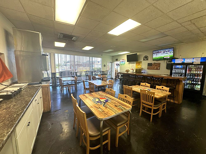 No-frills interior with a singular focus: serving incredible barbecue. The wooden tables and simple chairs say, "We invested in our smoker, not designer furniture."