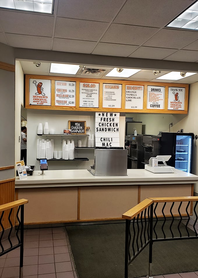 The counter where magic happens. Simple menu boards, minimal decor &ndash; Monroe's knows exactly what it is and doesn't pretend to be anything else.