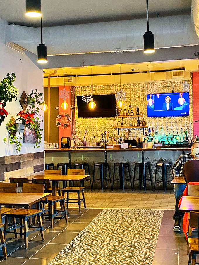 Where Mexico City meets Minneapolis—the warm glow of pendant lights, patterned tile, and wooden accents create an atmosphere that makes winter seem very far away.