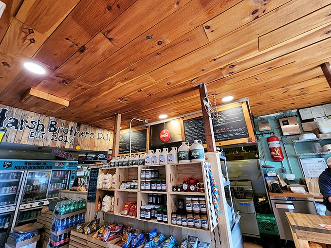 Rustic wood panels and chalkboard menus create the perfect sandwich sanctuary. This isn't interior design &ndash; it's comfort architecture at its finest.