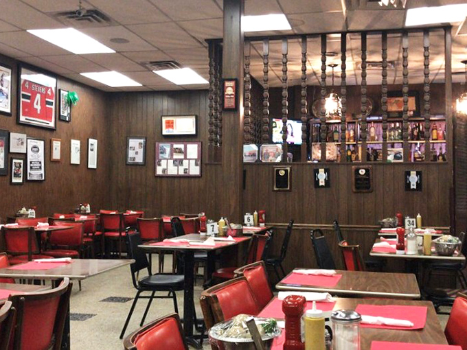 Step inside and time stands still&mdash;wood paneling, red booths, and memorabilia create the kind of atmosphere where calories don't count and conversations flow freely.