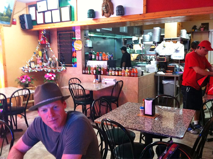 Simple tables, open kitchen, and that unmistakable aroma of simmering chilies. This isn't dining theater&mdash;it's the real, delicious deal.