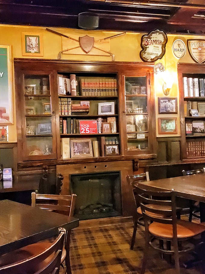 Bookshelves laden with leather-bound volumes and classic beer signs create that perfect "Cheers meets Shakespeare" vibe everyone secretly craves.