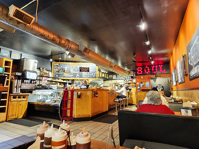 Where barbecue dreams come true. The open kitchen layout lets you witness the magic while that "SOUL" sign speaks the absolute truth.