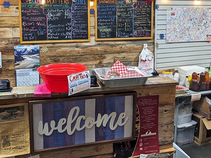 Behind that rustic "welcome" sign lies a world of culinary treasures scrawled on chalkboards. The menu isn't fancy, but neither are life's greatest pleasures.