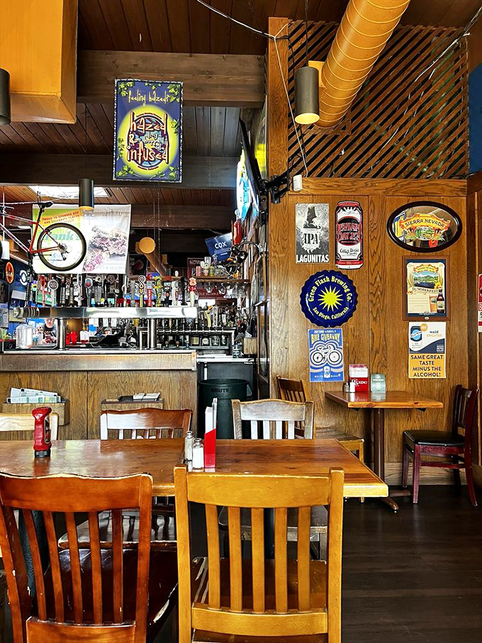 Beer signs and wooden warmth create the perfect backdrop for culinary memories. This isn't decoration&mdash;it's a visual history of good times.