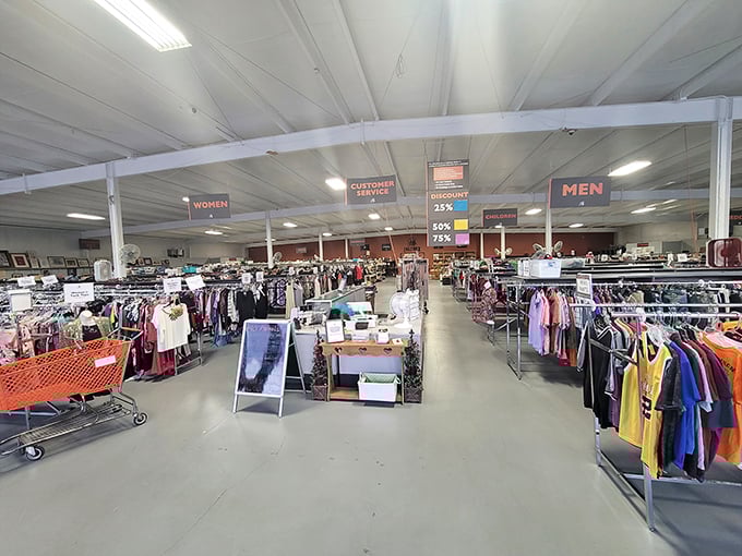 Organized chaos at its finest! Color-coded signs guide shoppers through this vast labyrinth of secondhand treasures spanning from clothing to collectibles.