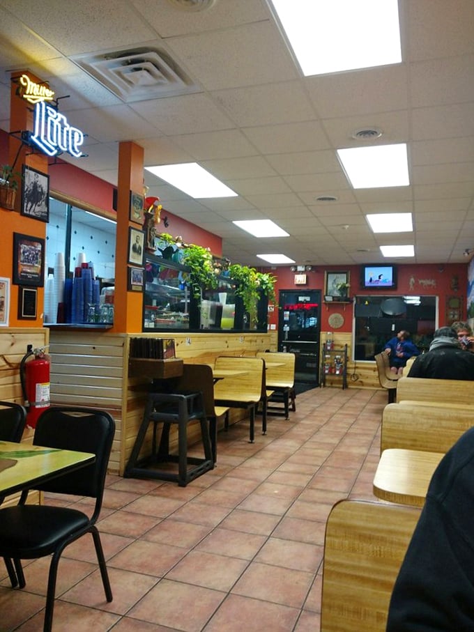 Inside, the no-frills dining room offers wooden booths, colorful walls, and the promise of authentic flavors. Simplicity with purpose&mdash;just like the best home cooking.