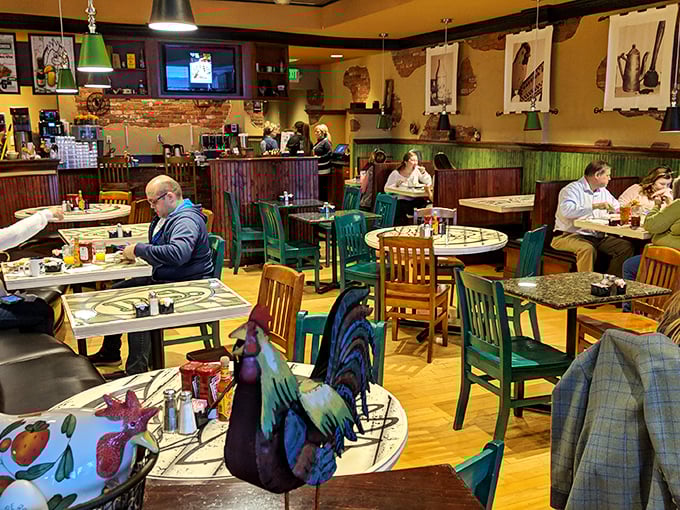 Colorful chairs, rooster decor, and happy diners create the breakfast equivalent of a warm hug. This isn't just eating&mdash;it's experiencing morning joy.