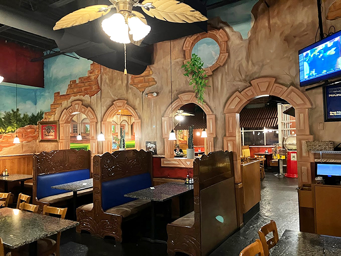 Step inside and suddenly you're not in Muskegon anymore. These hand-painted archways and palm-leaf ceiling fans transport you straight to Mexico.