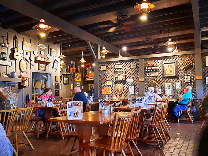 Where every wall tells a story. The dining room's rustic charm and vintage treasures create an atmosphere that's equal parts museum and grandma's kitchen.