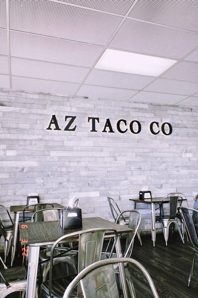 Industrial-chic meets Southwestern simplicity in this dining space where metal chairs and whitewashed brick create the perfect backdrop for flavor explosions.