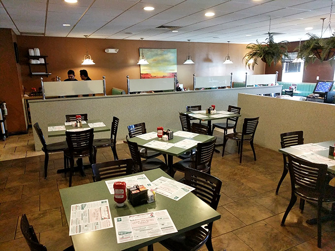 Booths that invite lingering conversations and tables spaced just right for privacy. The warm earth tones of this dining room let you know the food, not the decor, is the real star.