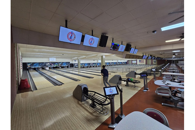 Gleaming lanes stretch toward bowling infinity, each one a stage for family drama, friendly competition, and the occasional miraculous spare.