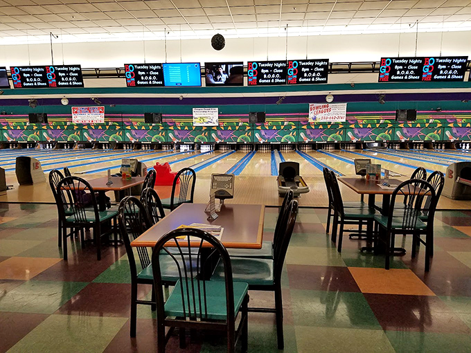 Classic bowling lanes stretch before you like runways of possibility, each one promising either glory or hilarious defeat.