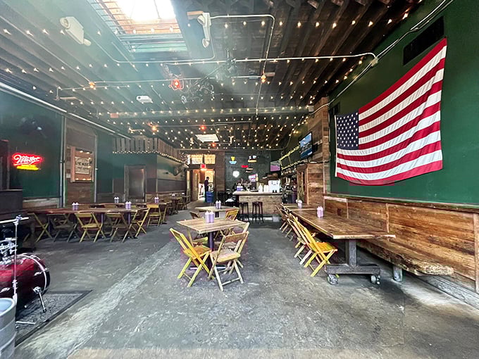 String lights twinkle overhead like a Texas sky, while wooden tables invite you to settle in for a feast worth every minute in line.