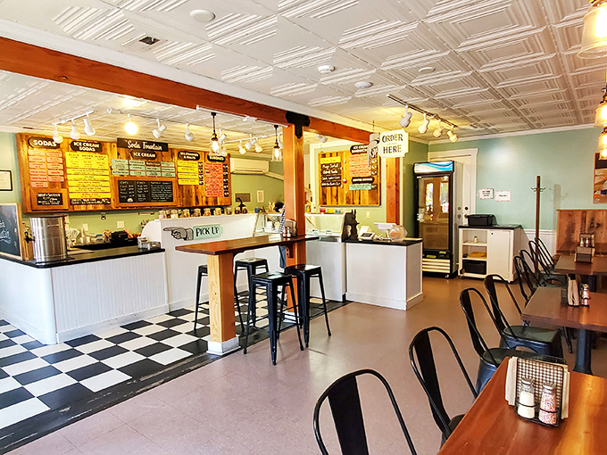 Inside, the black-and-white checkered floor and pressed tin ceiling create that perfect time-capsule vibe&mdash;like stepping into your grandparents' favorite hangout, only with better sandwiches.