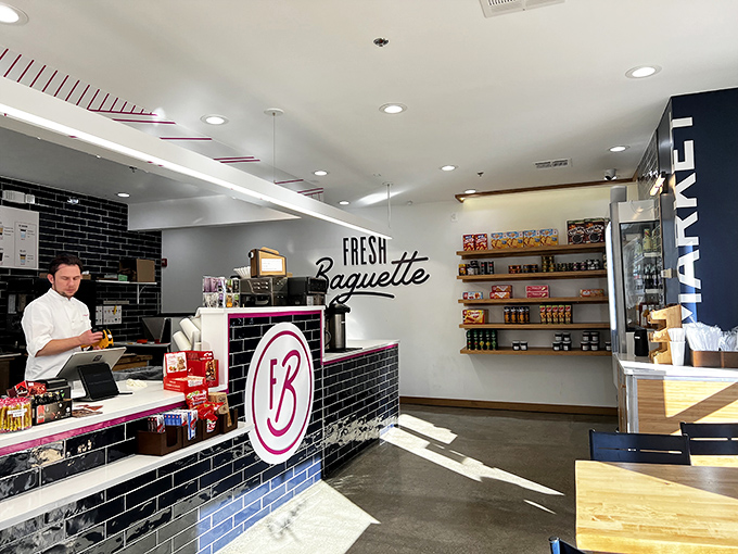 The sleek interior combines modern design with French bakery tradition &ndash; those black subway tiles aren't just pretty, they're setting the stage for carb-based euphoria.