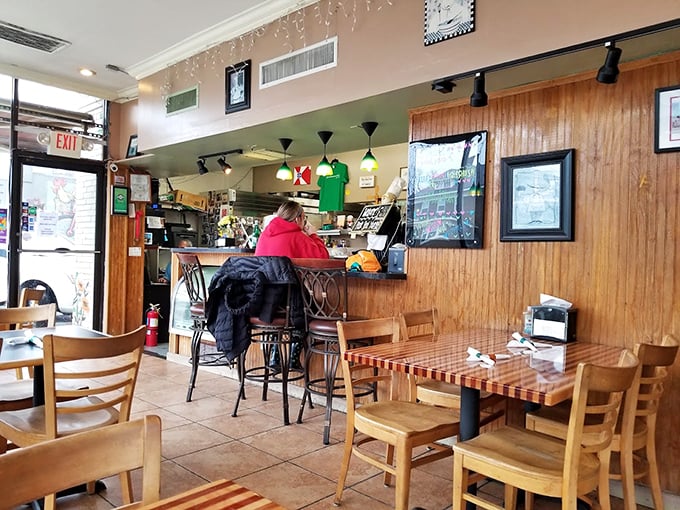 Wooden paneling and simple furnishings create that rare atmosphere where you instantly know the food, not the decor, is the star of this show.