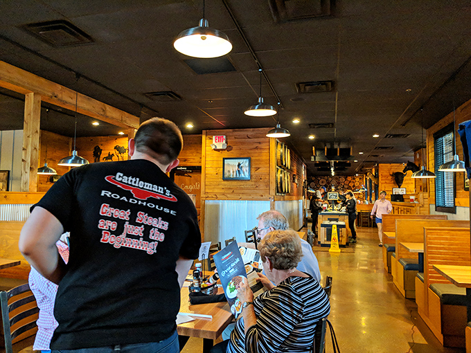 Inside, wood-paneled warmth and pendant lighting create that perfect "come as you are, leave fuller" atmosphere that defines Kentucky hospitality.