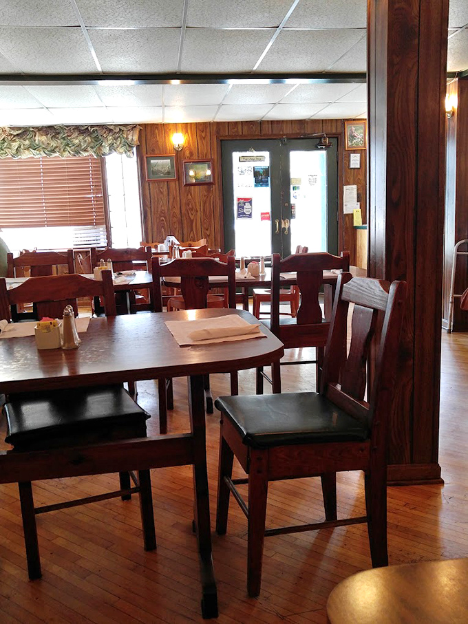 Wood-paneled walls and sturdy furniture create the perfect backdrop for comfort food magic. No designer needed &ndash; just decades of honest hospitality.