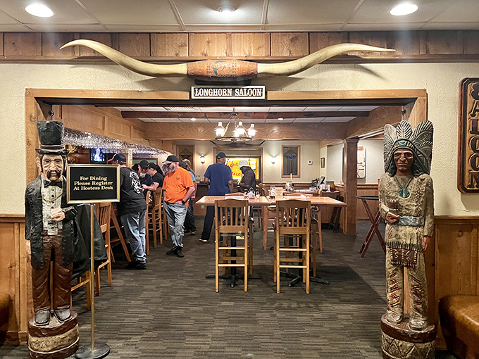 Step into the Longhorn Saloon and you're greeted by wooden cigar store figures standing sentinel. It's like walking into a Western movie where the happy ending is always a perfect steak.