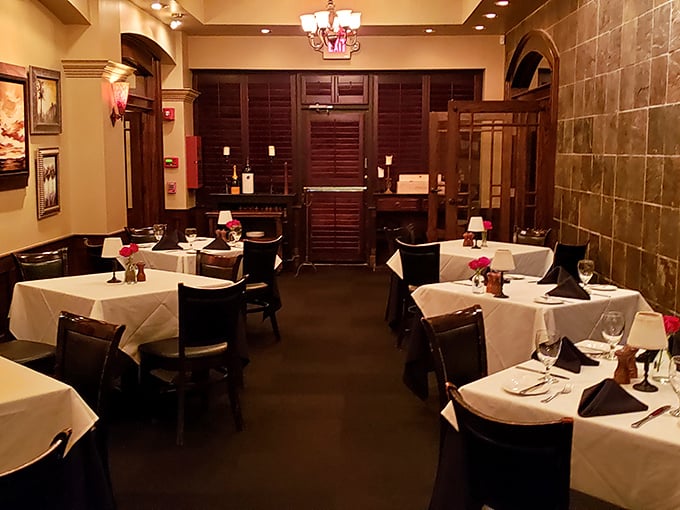 White tablecloths and dark wood create that perfect steakhouse atmosphere&mdash;elegant enough for special occasions, comfortable enough to focus entirely on the beef.