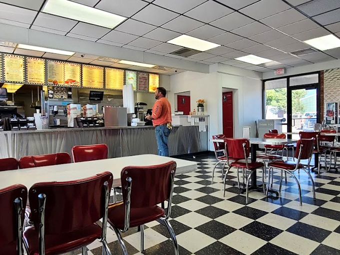 The classic black and white checkered floor isn't just decoration&mdash;it's the stage where generations of Kansas families have gathered for comfort food and conversation.