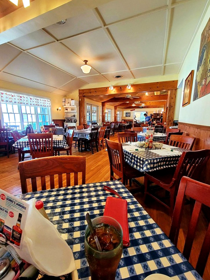 Blue-checkered tablecloths and warm wood beams create the perfect backdrop for comfort food conversations. This isn't d&eacute;cor&mdash;it's a Southern hug in restaurant form.