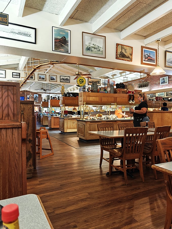 Railroad history meets culinary present inside The Great 611, where train memorabilia adorns walls and the aroma of sizzling steaks fills the air.