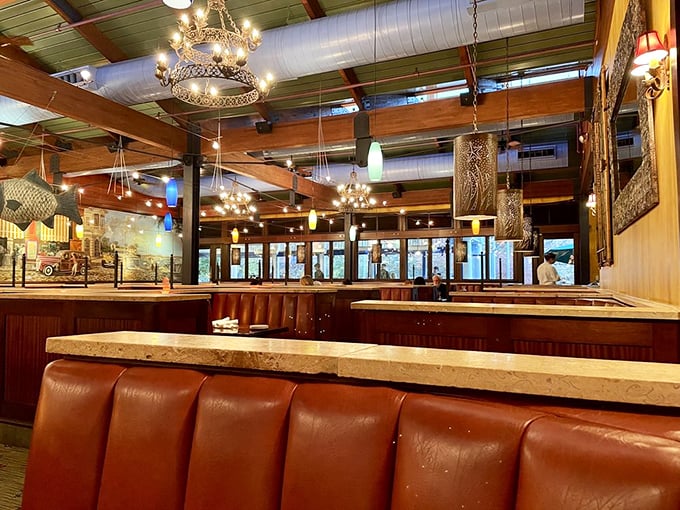 Rich leather booths, warm wood tones, and elegant chandeliers create the perfect backdrop for seafood indulgence without the sand in your shoes.