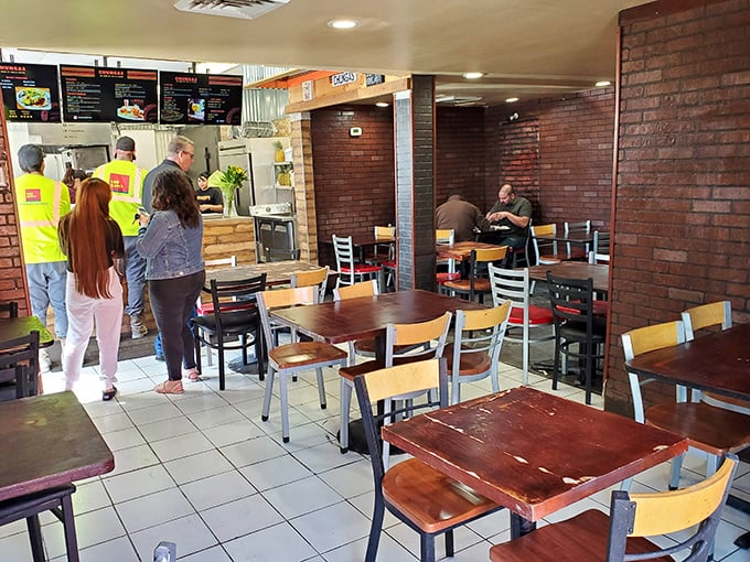 Simple wooden tables, brick walls, and the promise of authentic Mexican flavors. This isn't where you come for the decor—it's where you come for food that speaks fluent deliciousness.